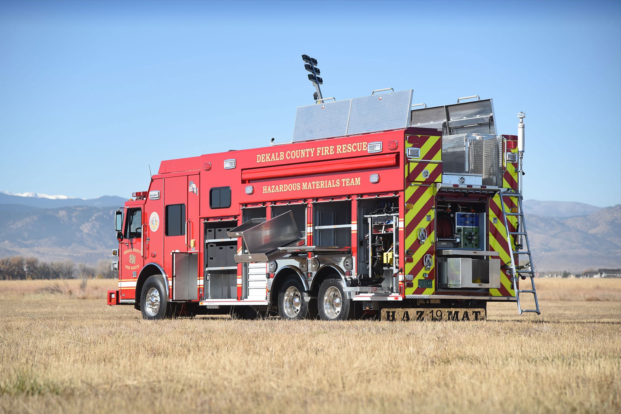 Firefighters With Hazmat Truck